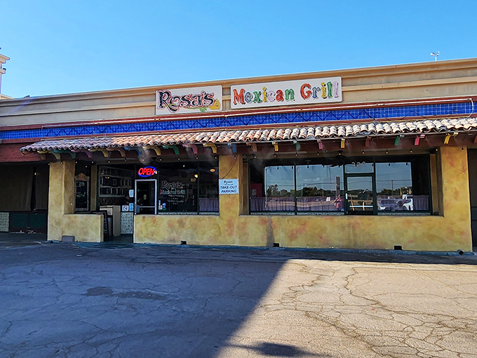 The rainbow-colored sign beckons like a fiesta invitation. Rosa's Mexican Grill might sit in a modest strip mall, but those vibrant letters promise culinary adventures await inside.