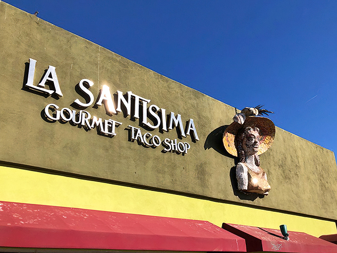La Santisima's exterior welcomes hungry visitors with its distinctive colors and artistic flair—a preview of the flavor fiesta waiting inside.