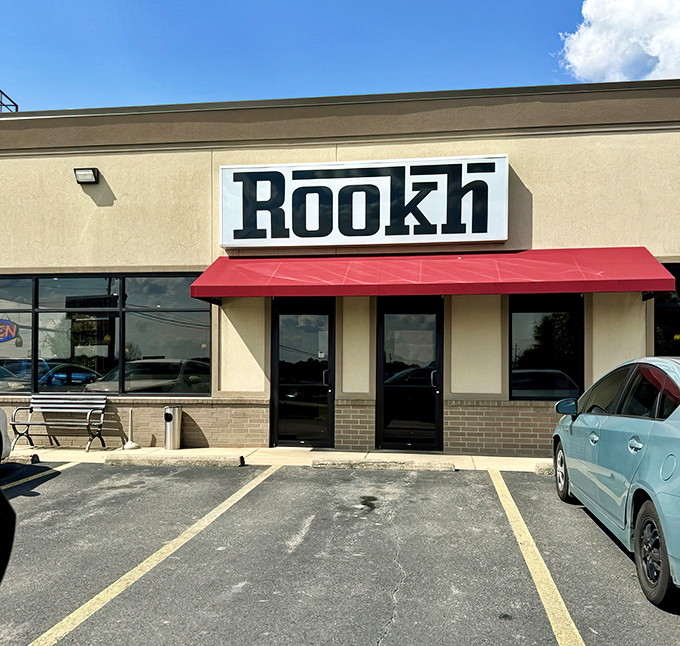 The unassuming exterior of Rookh belies the culinary adventure waiting inside. That red awning is like a beacon calling to hungry explorers in Bryant.