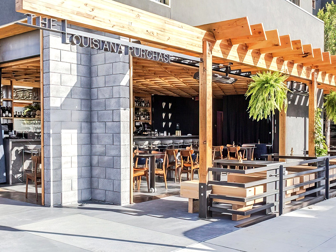 The wooden pergola and lush hanging plants at Louisiana Purchase's entrance might make you forget you're in San Diego and not a French Quarter courtyard.