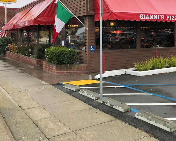 That red awning waves like a delicious flag of surrender to hunger pangs everywhere.