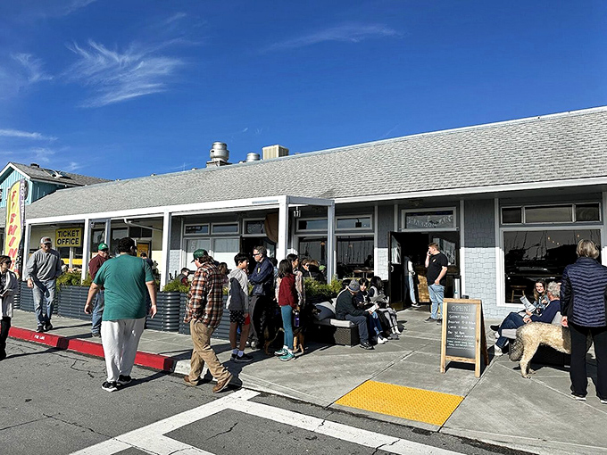 The coastal charm of Ketch Harbor Bar beckons with its weathered wood exterior and inviting patio—California seaside dining at its most authentic.