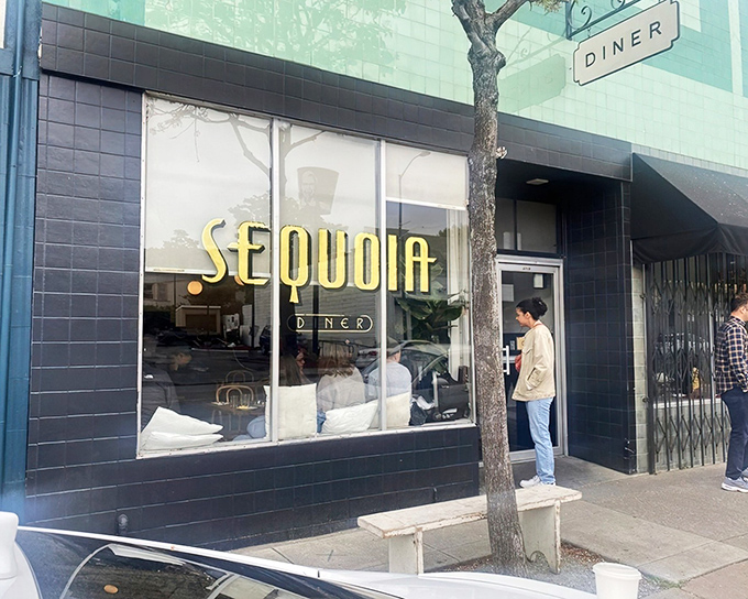 Step inside and suddenly you're in breakfast's version of a warm hug, complete with golden lettering that means business.