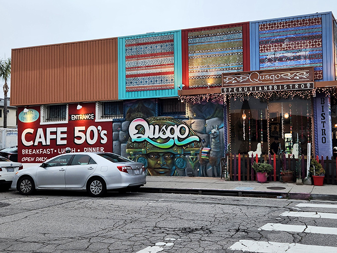 The neon-lit facade of Cafe 50's stands as a technicolor time portal on Santa Monica Boulevard, beckoning hungry time travelers with its vintage charm.