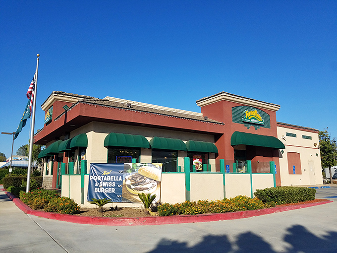 The humble tan and red exterior with signature green awnings might not scream "culinary destination," but your taste buds will thank you for stopping.