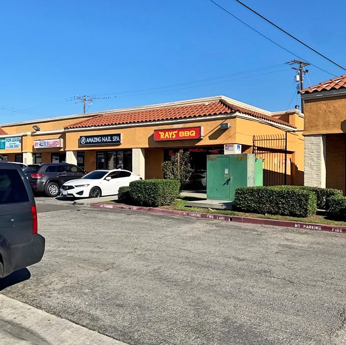 The unassuming storefront of Ray's BBQ in Huntington Park – proof that the best barbecue joints often hide in plain sight, waiting to change your life forever.