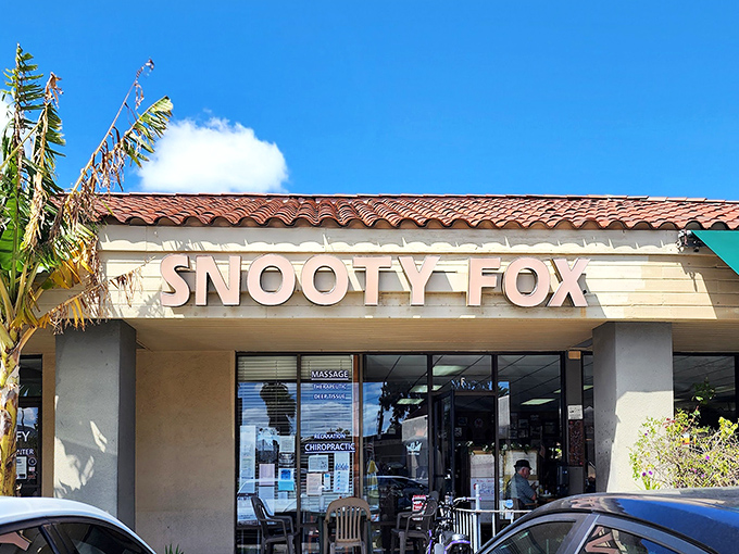 The unassuming storefront of Snooty Fox belies the culinary treasures within. Like finding a Picasso at a yard sale, this modest exterior hides breakfast brilliance.