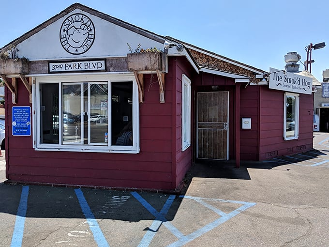That cartoon pig on the sign knows something you don't yet—this tiny spot houses smoky treasures worth driving hours for.