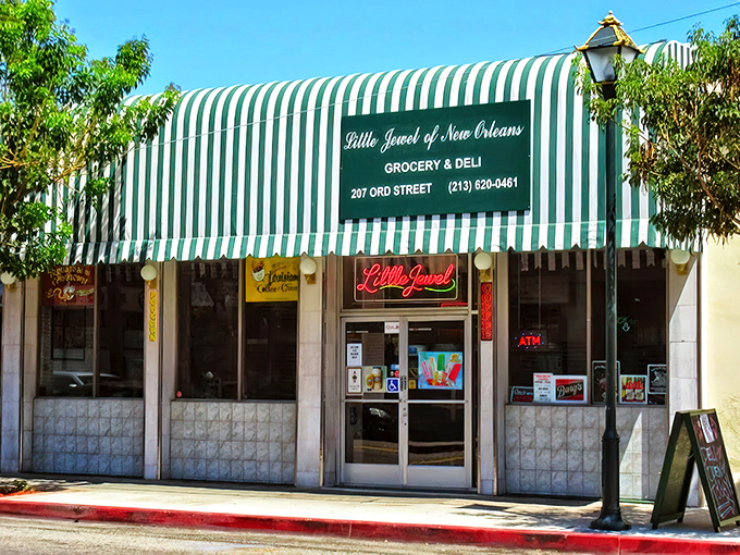 The green and white striped awning of Little Jewel stands out in Chinatown like a Saints fan at a Rams game. A culinary portal to New Orleans hiding in plain sight.