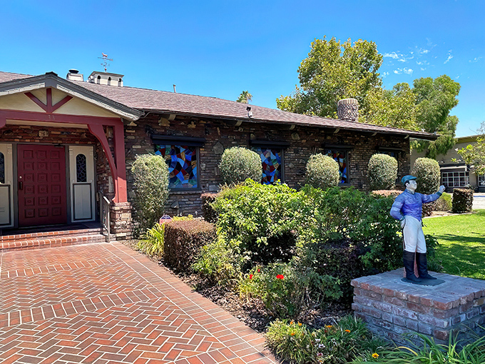 The stone facade of The Derby stands like a culinary fortress in Arcadia, promising carnivorous delights within those unassuming walls.