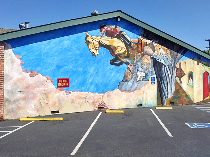 The cowboy mural leaping across this Santa Cruz diner's exterior isn't just decoration&mdash;it's a promise of the wild west of flavor waiting inside.