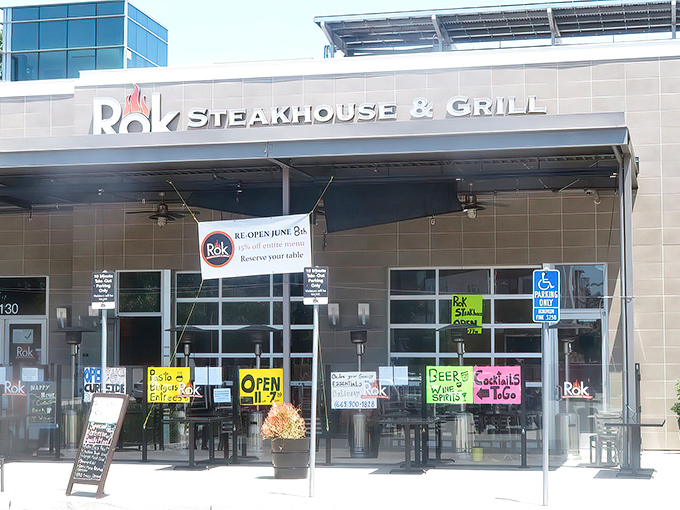 The modern exterior of Rok Steakhouse & Grill beckons hungry travelers with promises of sizzling volcanic adventures within.