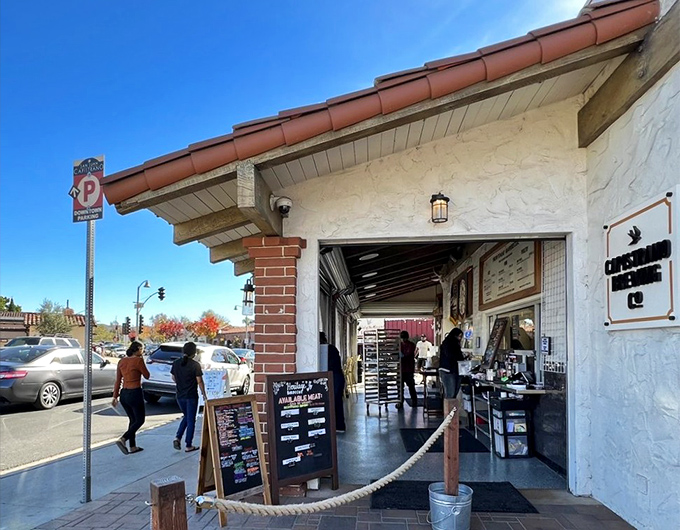 The unassuming exterior of Heritage Barbecue hides a smoky paradise within. Like finding a Picasso at a yard sale, this modest building houses barbecue greatness.