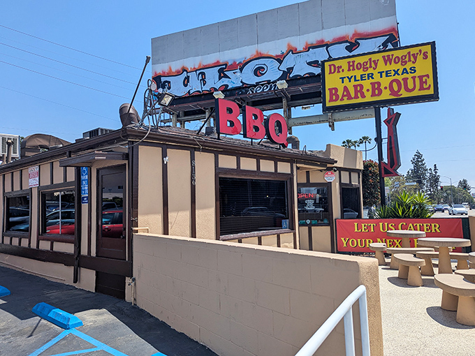 The sign alone is worth the drive&mdash;bold, unapologetic, and promising smoky delights that'll make your cardiologist wince and your taste buds rejoice.