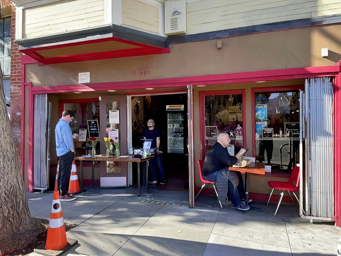 Another angle reveals the open-air ordering setup where magic happens daily and dreams come wrapped in butcher paper.