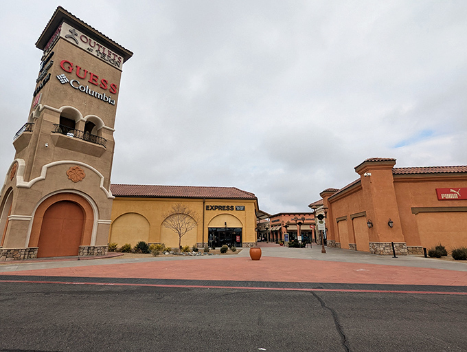 That towering beacon signals retail salvation awaits, where Columbia Sportswear and other brands gather like old friends at a shopping reunion.