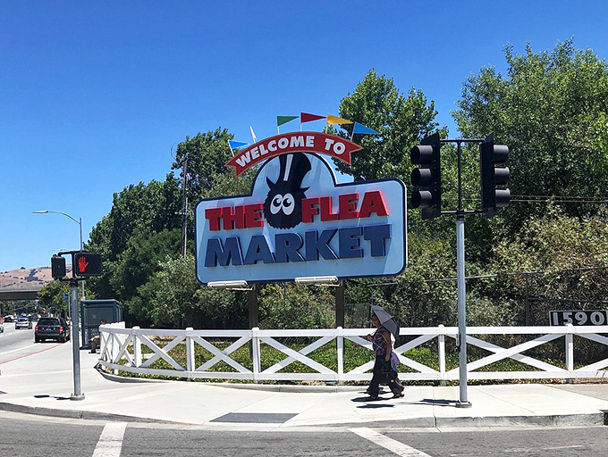 That cheerful flea mascot knows what's waiting inside - California's ultimate treasure hunting playground where memories are made.