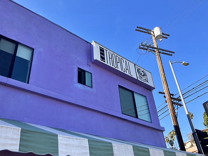 A bold splash of purple and a green-striped awning mark this corner gem in Silver Lake &mdash; Caf&eacute; Tropical, a beloved Cuban spot drawing food lovers from all over California.