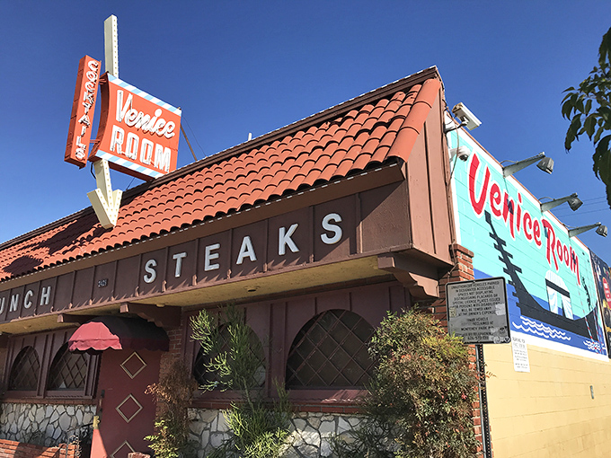 The neon sign beckons like a mid-century mirage. Venice Room's terra cotta roof and vintage fa&ccedil;ade promise a time-traveling steak adventure in Monterey Park.