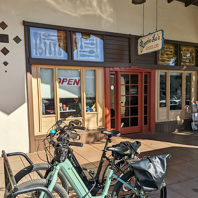 Cyclists know the best fuel stops! Bonnie Lu's facade with its distinctive red door promises comfort food worth pedaling across town for.