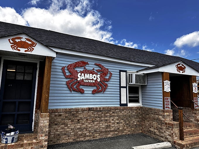 The blue exterior with those giant red crab signs isn't just decoration&mdash;it's nature's way of saying "seafood paradise ahead!"