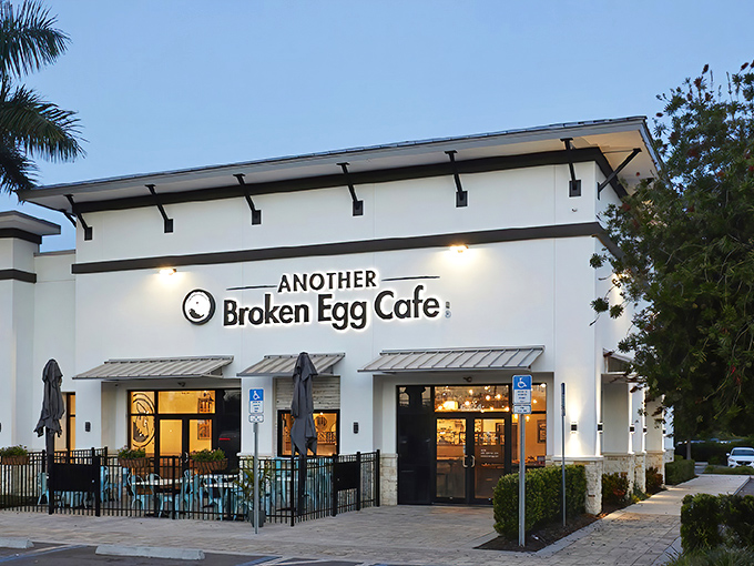 The bright white exterior with signature teal accents invites you in like a breakfast beacon on South Semoran Boulevard. Morning magic awaits!