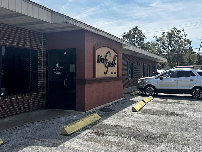 The unassuming brick exterior of Dixie Grill hides culinary treasures within. Like finding a Picasso at a yard sale, the modest fa&ccedil;ade belies the magic happening inside.