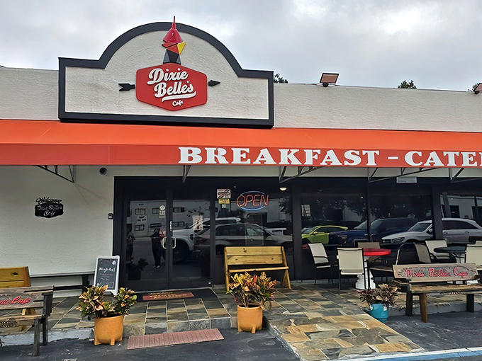 A welcoming patio with wooden benches invites you to take a load off before diving into what might be the best breakfast decision of your Florida vacation.