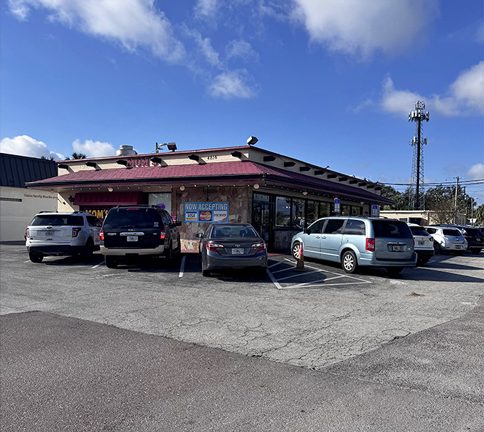 The unassuming exterior of Mom's Place stands like a breakfast beacon on Dale Mabry Highway, promising homestyle comfort that keeps the parking lot perpetually full.