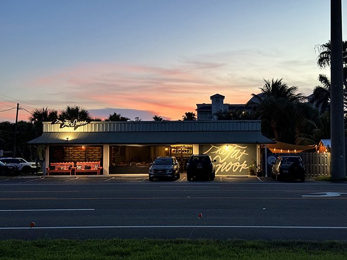 The Fat Snook at sunset is pure Florida magic &ndash; a humble exterior that belies the culinary treasures waiting inside. Like finding a pearl in an unassuming oyster.