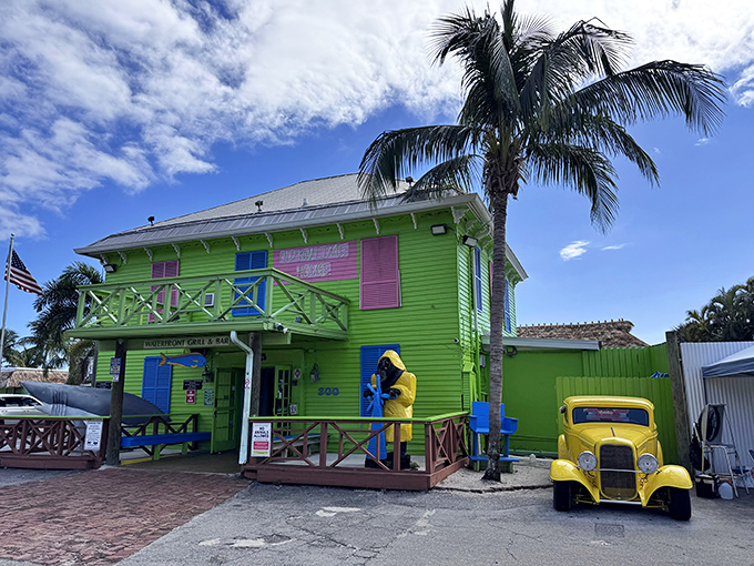 A vintage yellow hot rod parked outside completes the postcard-perfect scene. This isn't just a restaurant&mdash;it's a technicolor time machine to old Florida.