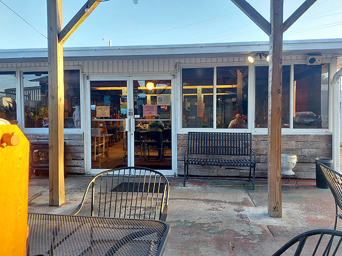 The unassuming entrance speaks volumes in BBQ language: "Fancy isn't on the menu, but life-changing ribs definitely are."