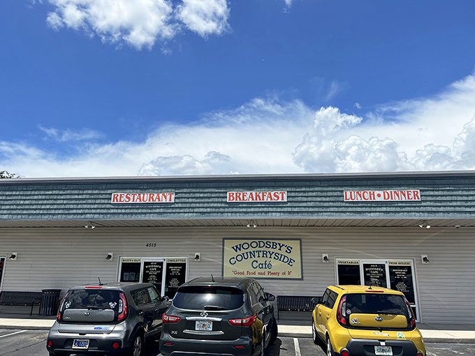 The unassuming exterior of Woodsby's Countryside Cafe promises what Florida locals treasure most: honest food without the tourist markup.