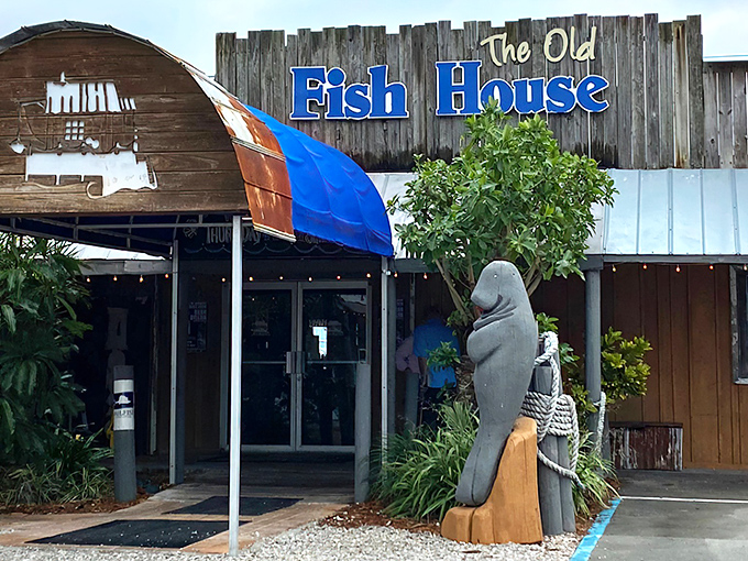 The weathered wooden exterior and iconic manatee statue aren't trying to impress anyone&mdash;they're too busy guarding the entrance to seafood paradise.