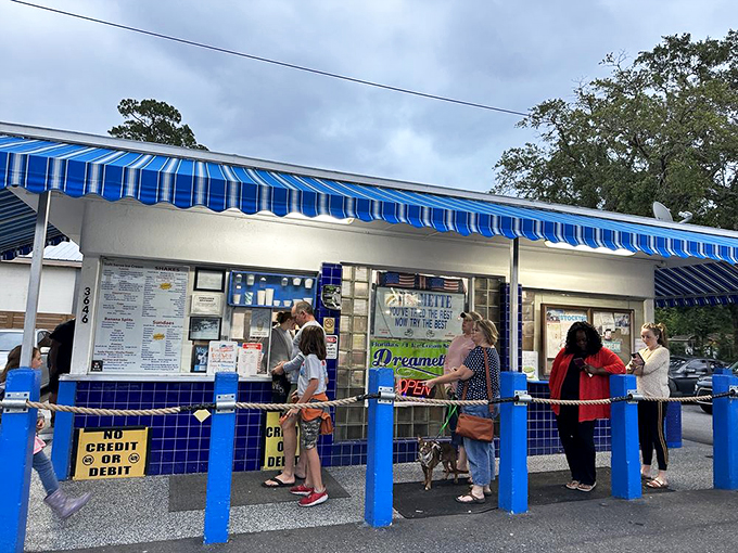 The iconic blue and white striped awning of Dreamette beckons like a frozen oasis in the Florida heat. Sweet salvation awaits!