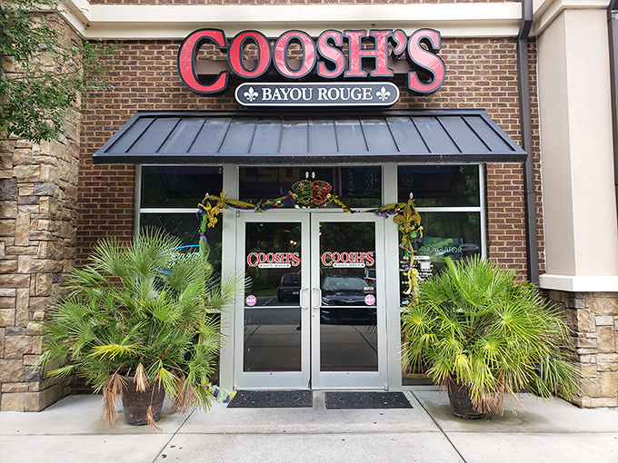 The brick-and-stone facade of Coosh's Bayou Rouge beckons like a Louisiana transplant in the heart of Tallahassee, promising Cajun comfort just beyond those doors.