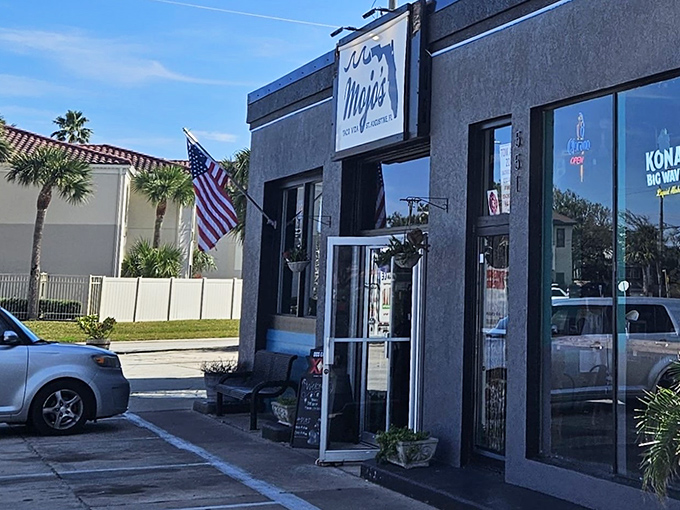 A slice of St. Augustine charm with an American flag proudly displayed &ndash; Mojo's storefront beckons hungry travelers and locals alike.
