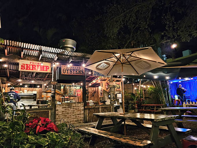 The backyard paradise you've been dreaming of &ndash; complete with picnic tables, twinkling lights, and signs promising fresh seafood treasures.