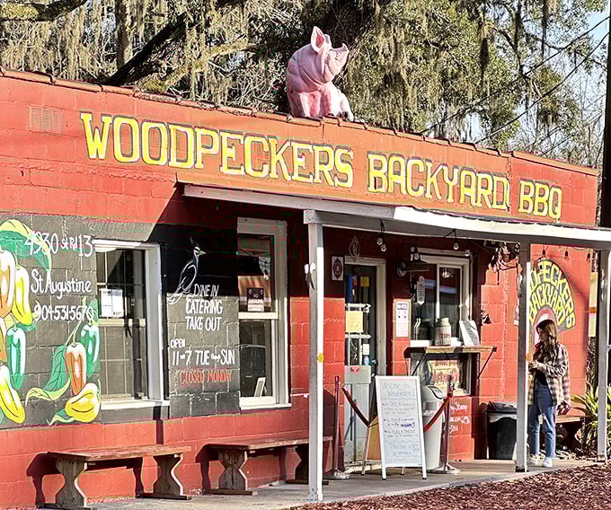 The pink pig perched atop this unassuming red building isn't just decoration&mdash;it's a beacon calling hungry souls to barbecue salvation.