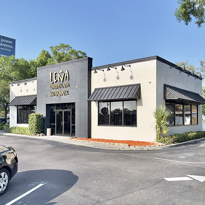 The unassuming exterior of Le&ntilde;a Churrascaria Steakhouse proves once again that culinary treasures often hide in plain sight, waiting for adventurous eaters to discover them.