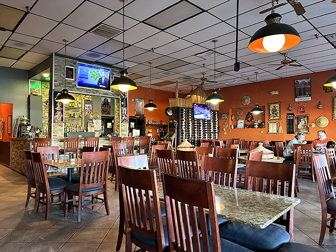 The unassuming storefront of Nile Ethiopian beckons like a culinary oasis in Orlando. Those wooden pillars aren't just supporting the roof&mdash;they're holding up flavor heaven.
