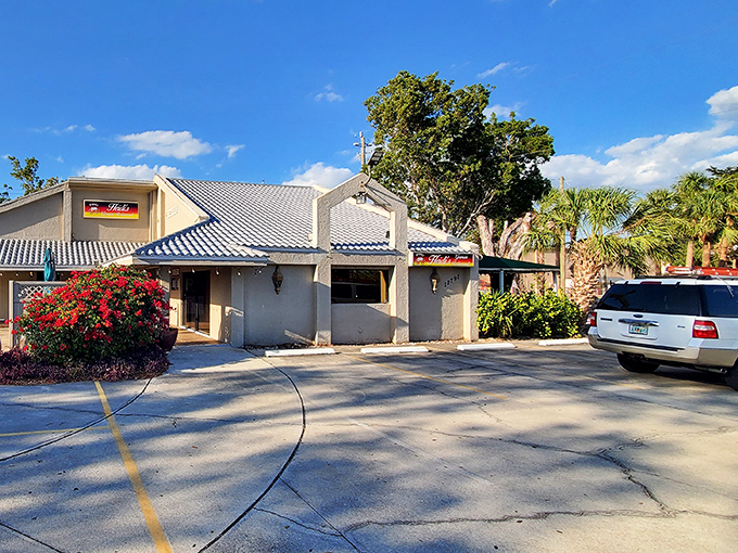 Heidi's modest exterior with its distinctive blue-tiled roof stands like a Bavarian mirage in the Florida sunshine, promising Alpine delights within.