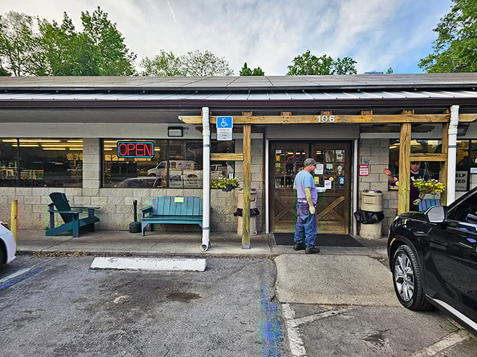 The unassuming exterior of Pearl's promises what fancy restaurants rarely deliver&mdash;authentic flavor without the fuss. Those blue benches have heard decades of post-meal satisfaction sighs.