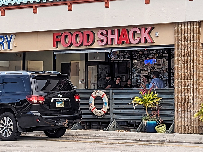 The unassuming exterior of Food Shack belies the culinary treasures within. Like finding Shakespeare writing in a mall food court.