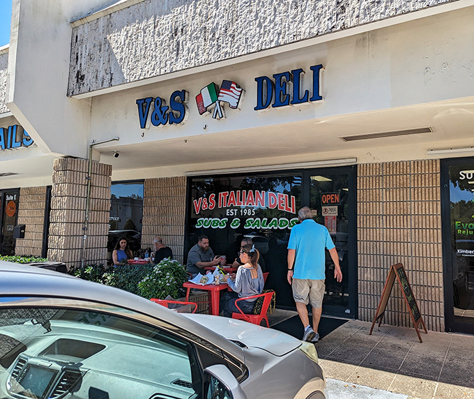 Those crossed Italian and American flags aren't just decoration&mdash;they're a promise of the cultural fusion waiting inside this beloved Boca Raton institution.