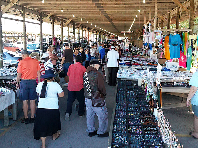 Tables stretching to the horizon like a treasure hunter's dream. One person's castoffs become another's prized discoveries under Florida's generous sunshine.