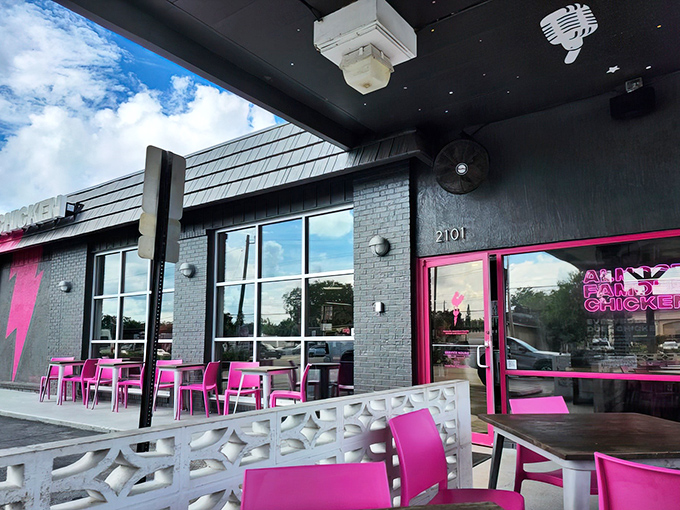LoveBird's exterior screams "rock star chicken joint" with its bold signage and modern design. Pink chicken silhouette? Absolutely necessary.