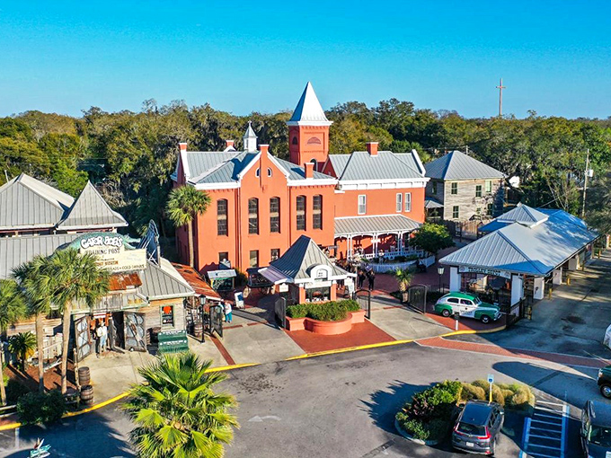 The salmon-pink facade of St. Augustine's Old Jail Museum stands as a masterpiece of architectural misdirection—"Come for the incarceration, stay for the Victorian charm!"