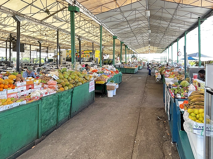A produce paradise where mangoes, bananas, and tropical fruits create a farmers' market within the market. Your grocery list doesn't stand a chance here.