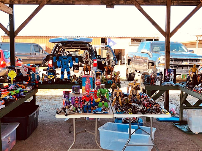 Action figures, robots, and collectibles line the tables, turning this flea market stall into a treasure trove where every shelf sparks a bit of nostalgia.